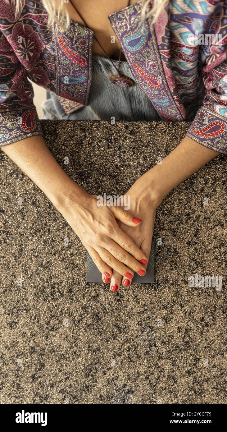 Top view of a tarot reader's hands over the tarot deck Stock Photo - Alamy