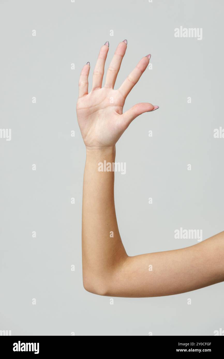 Womans arm extended up hi-res stock photography and images - Alamy