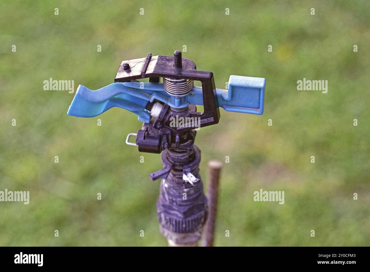 Automatic sprinkler system irrigates plants hi-res stock photography ...