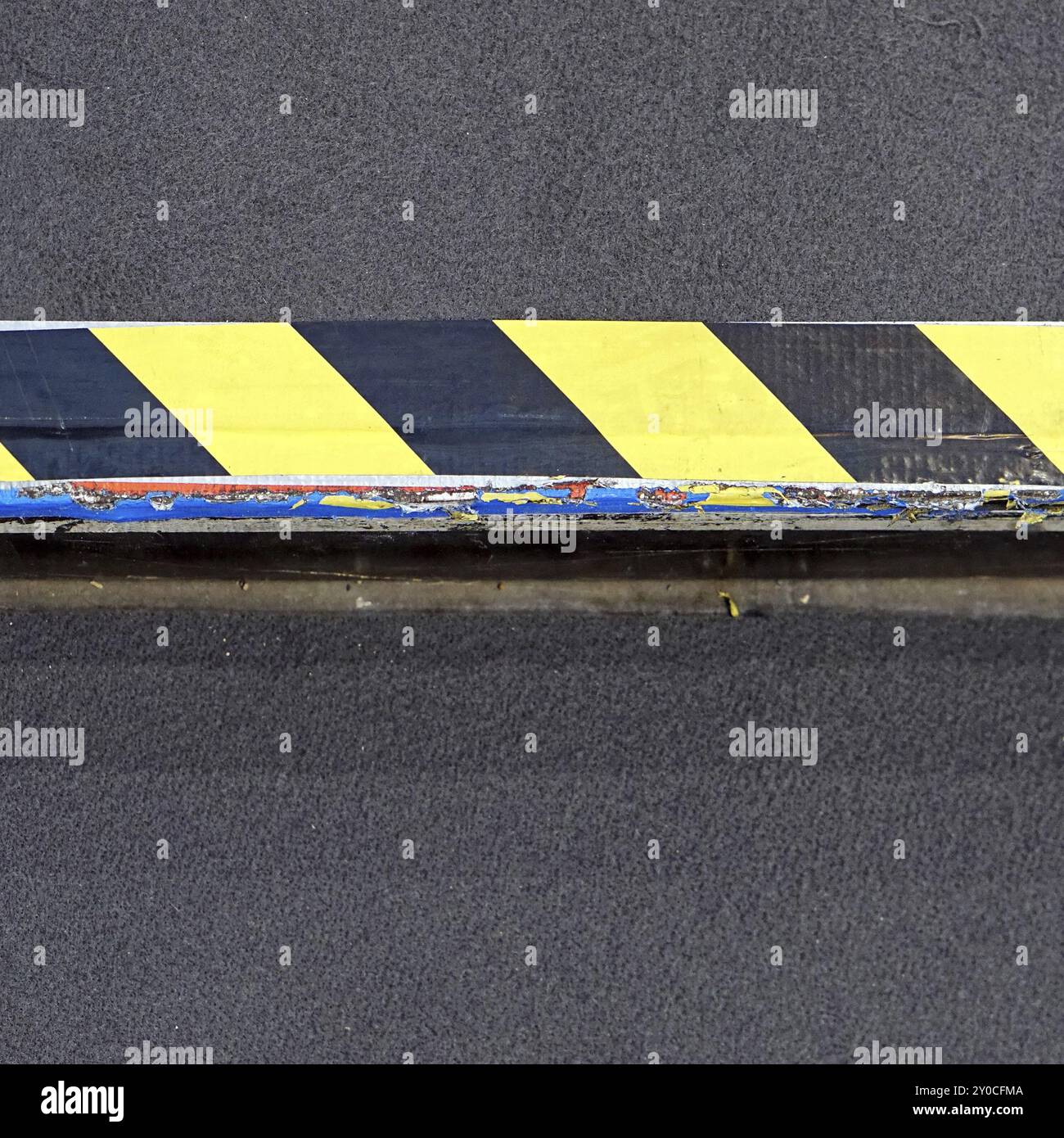 Yellow and black safety tape at step warning Stock Photo - Alamy