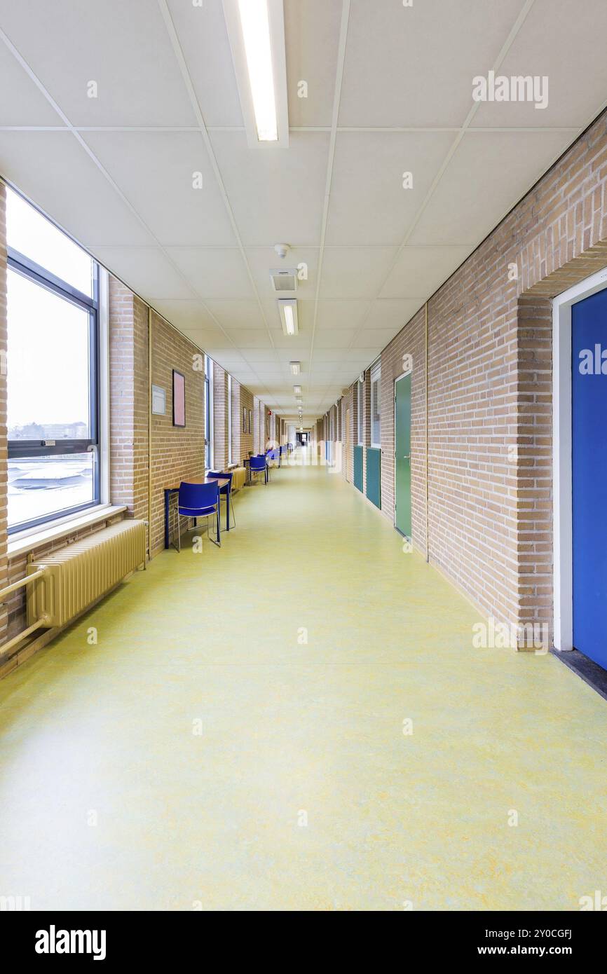 Long straight and empty corridor in secondary school building Stock ...