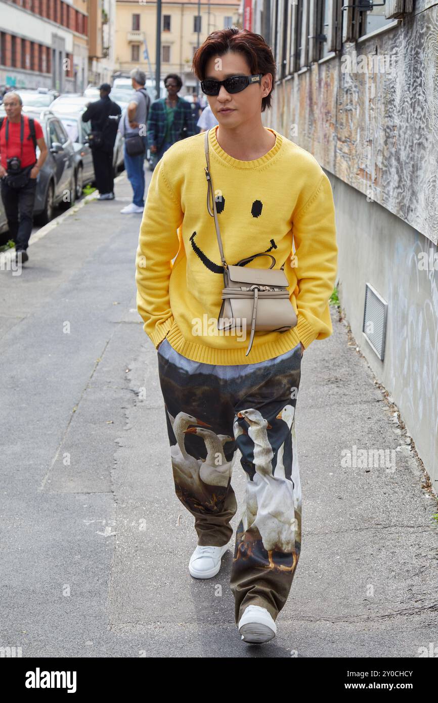 MILAN, ITALY - JUNE 14 , 2024: Alvin Chong with yellow sweater with ...