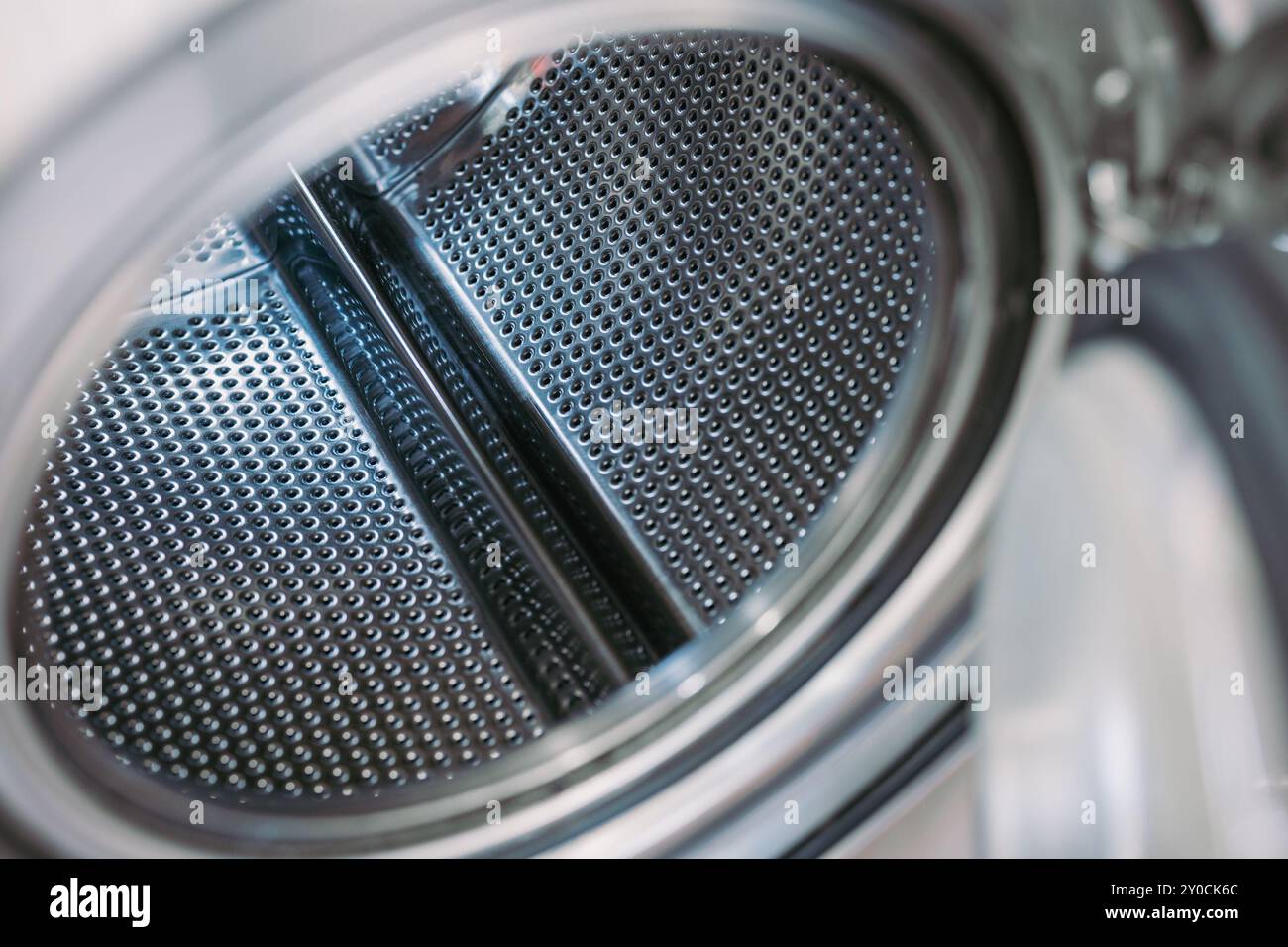 Interior of an industrial grade washing machine. Visible serrated or ...