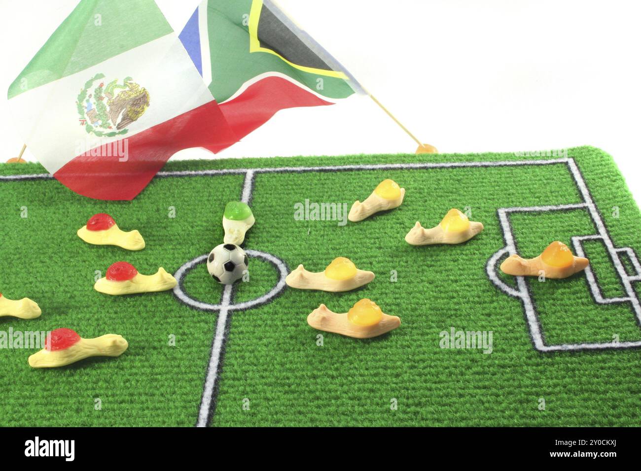 Snails playing football in front of a white background Stock Photo - Alamy