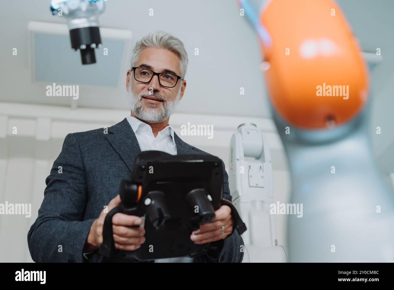 Automation, robotics engineer working on robotic knee replacement ...