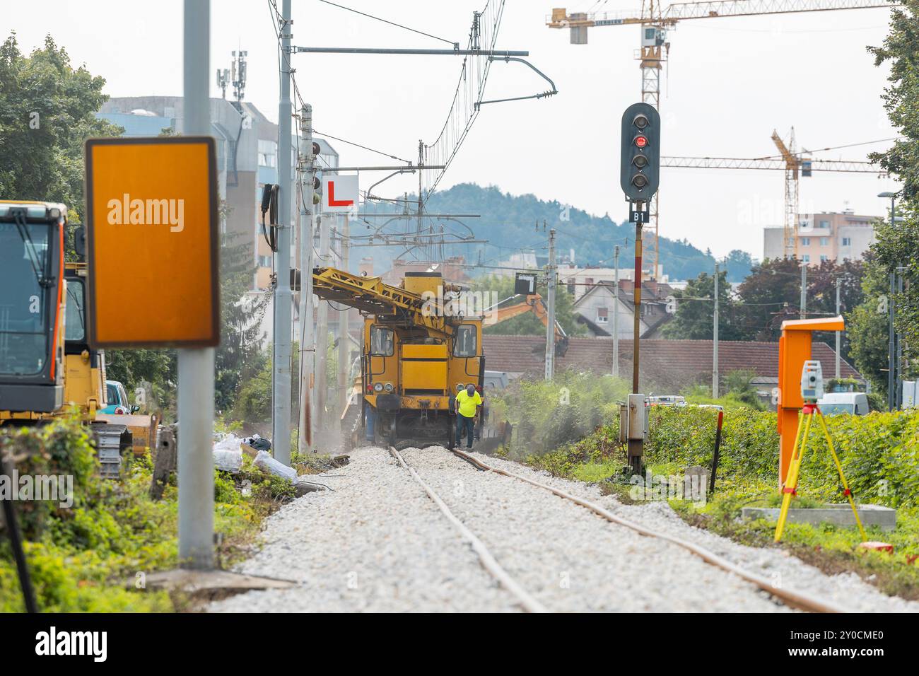 Heavy machinery on a railway tack that is under renovation. Fresh track ...