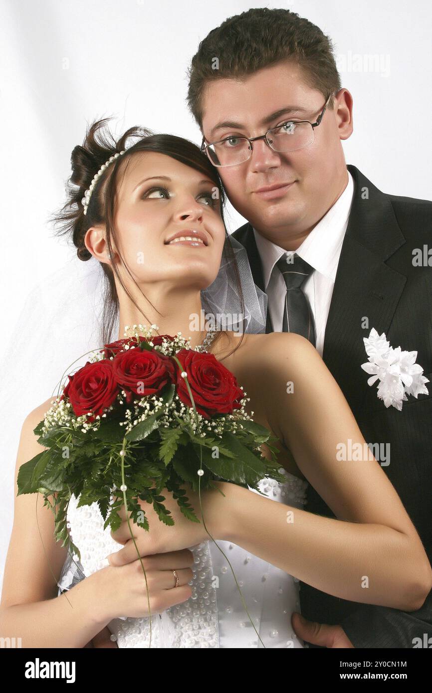 Newly married together in a photo pose Stock Photo - Alamy