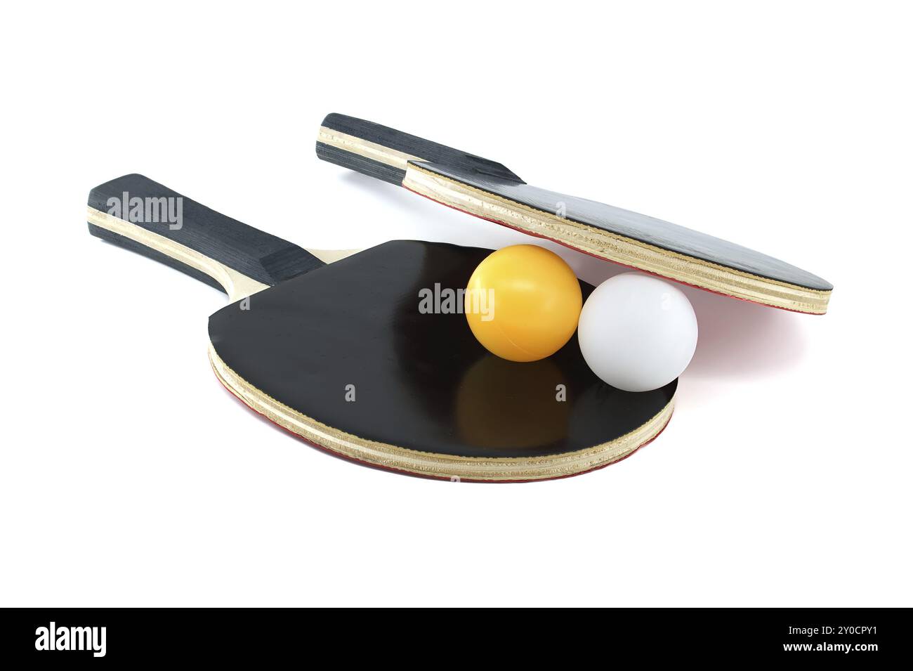 Isolated on a white background are two ping pong paddles and a ping ...