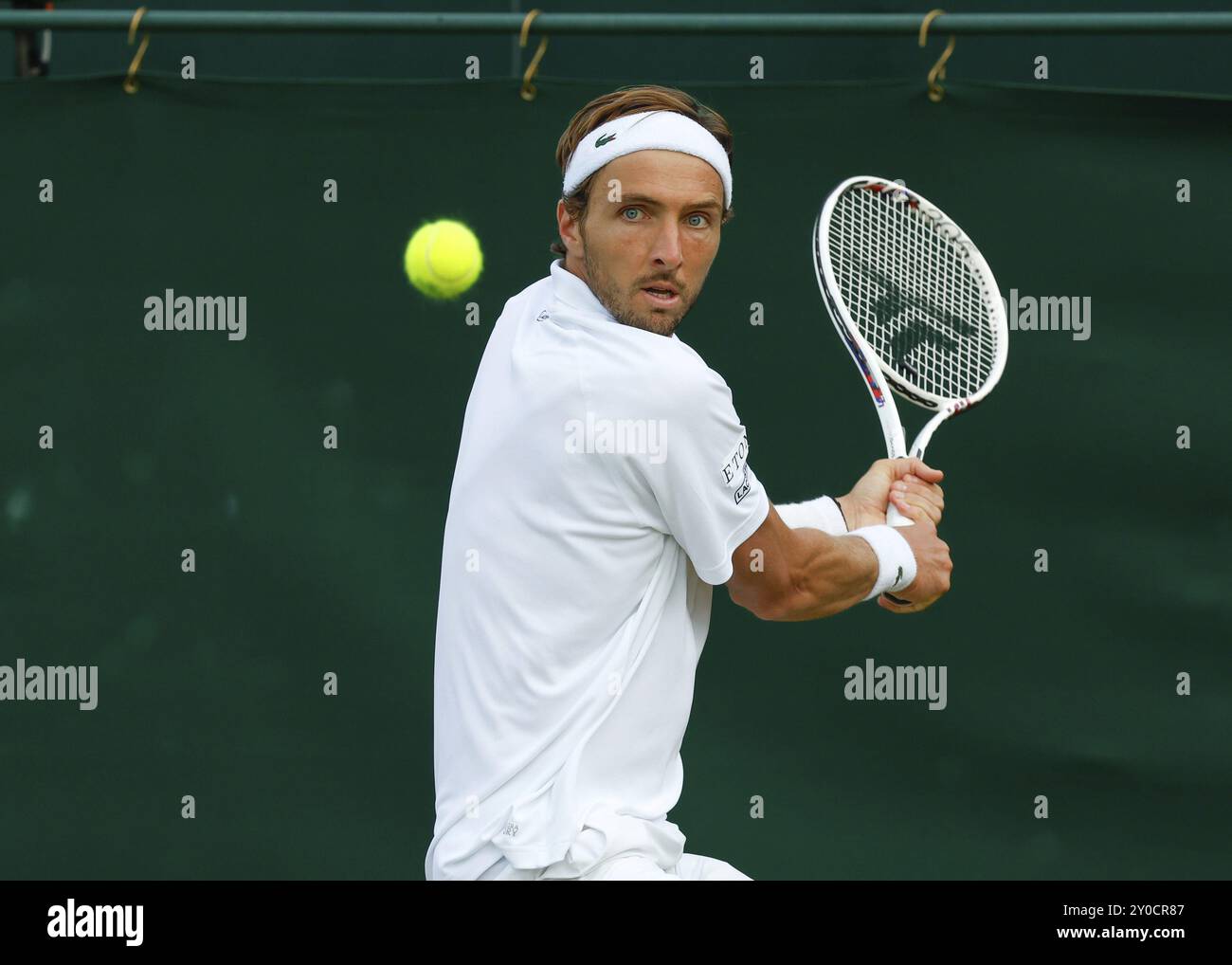 French tennis player Arthur Rinderknech in action at the 2024 Wimbledon ...