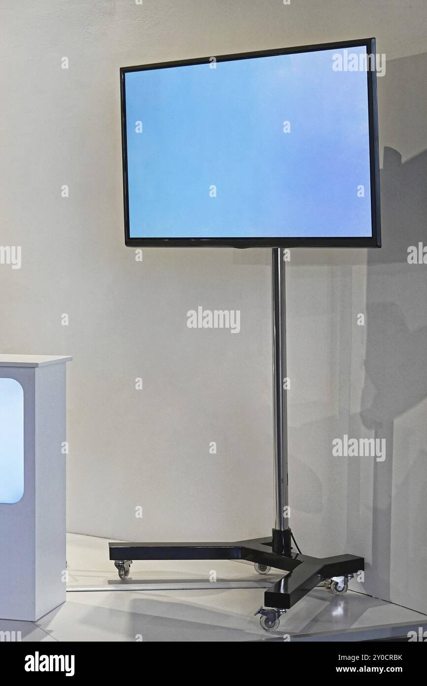 Big lcd TV display stand at exhibition Stock Photo - Alamy