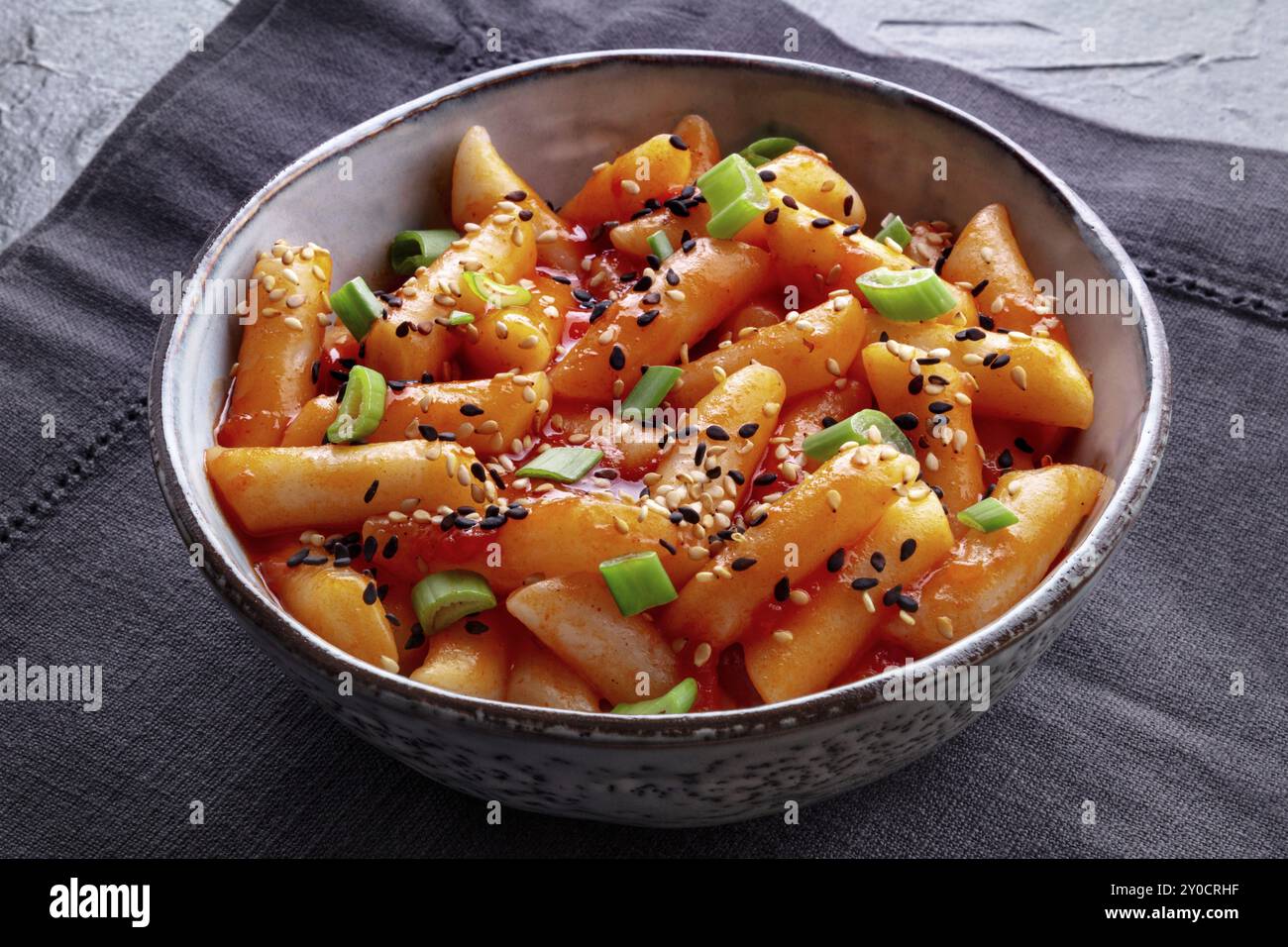 Tteokbokki or topokki, Korean street food, spicy rice cakes in red ...