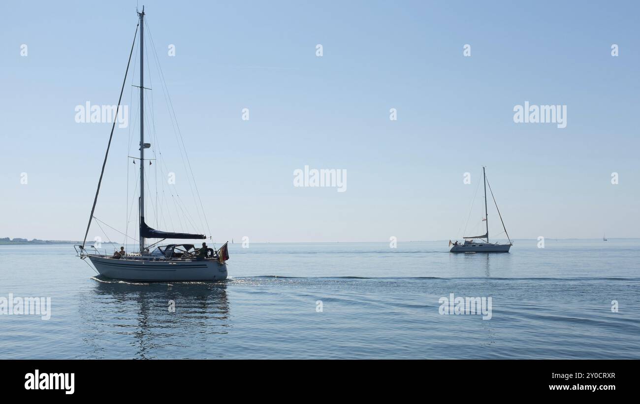 Two sailing yachts crossing on baltic sea Stock Photo - Alamy