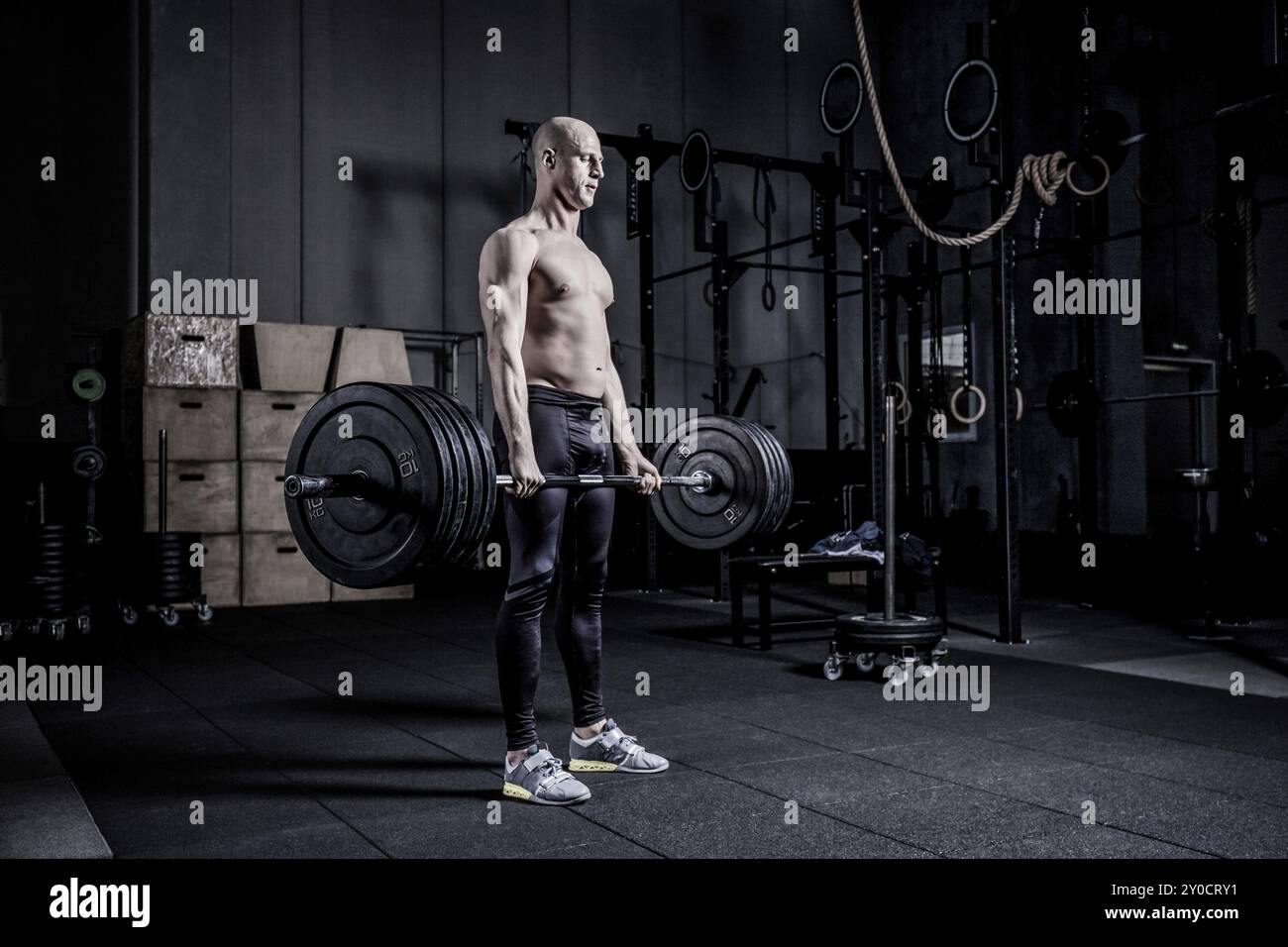Muscular Man Doing Heavy Deadlift Exercise. Dramatic color grading ...