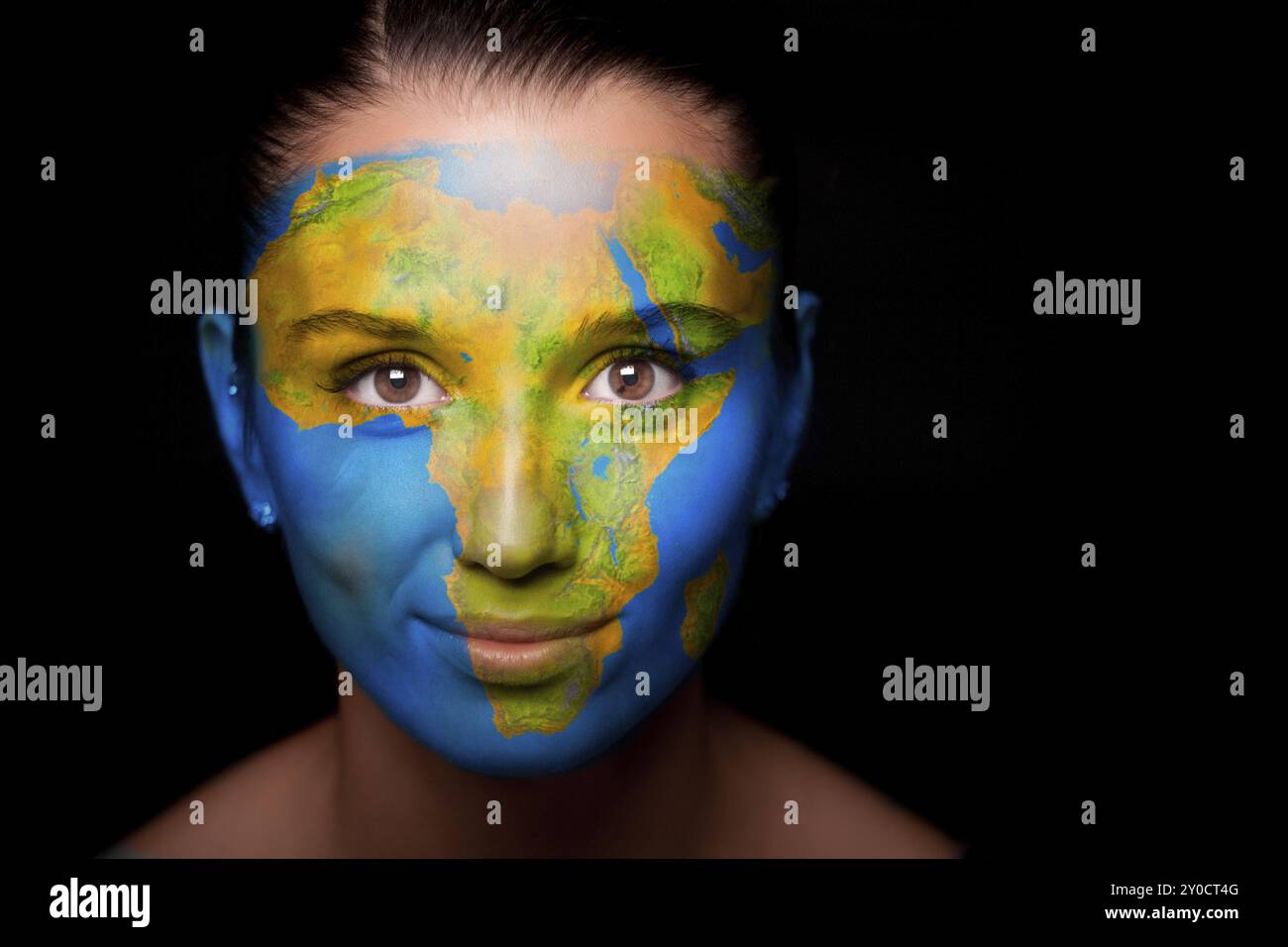 Girl with a painted map of Africa on his face. Closeup Stock Photo - Alamy