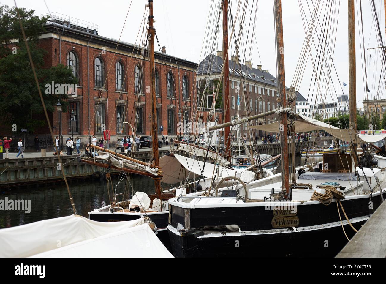 Copenhagen, Denmark - August 22, 2024: Colourful, captivating Nyhavn is ...