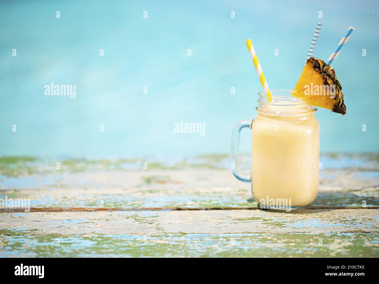 Exotic pineapple cocktail near pool. Pina colada Stock Photo - Alamy
