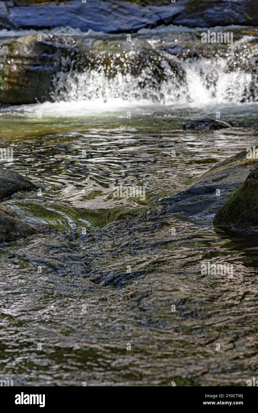 Small river and waterfall between the Itatiaia National Park rocks in ...