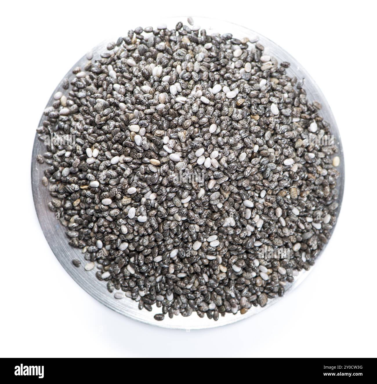 Small portion of Chia Seeds (isolated on white background Stock Photo ...