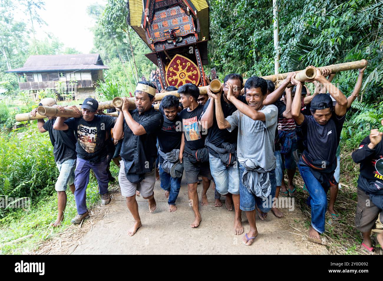 Scenes from traditional tana toraja funeral ceremony, people dancing ...