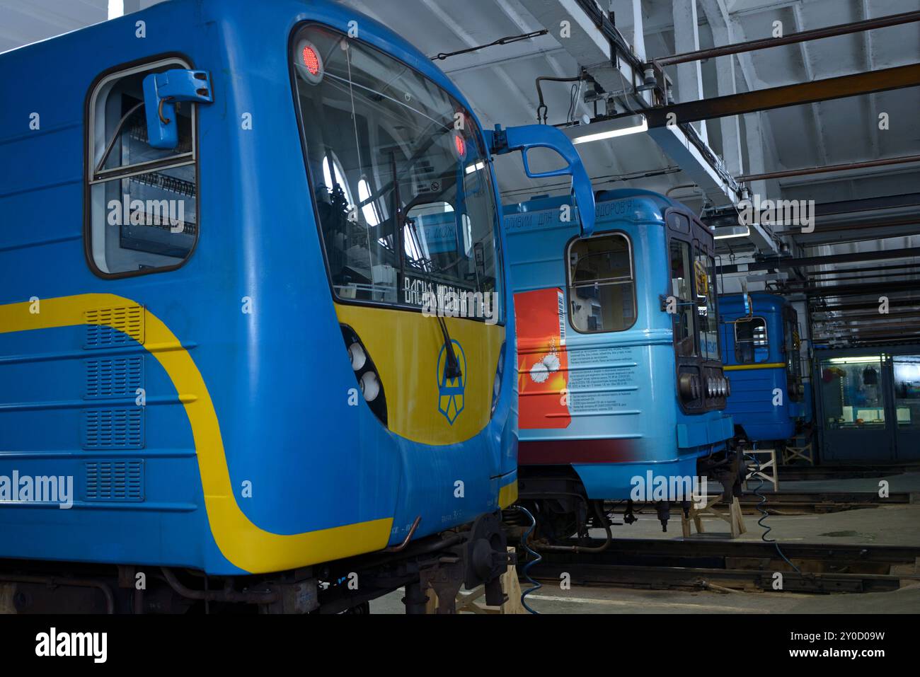 subway trains parked on pits for technical inspection. Subway car shed ...
