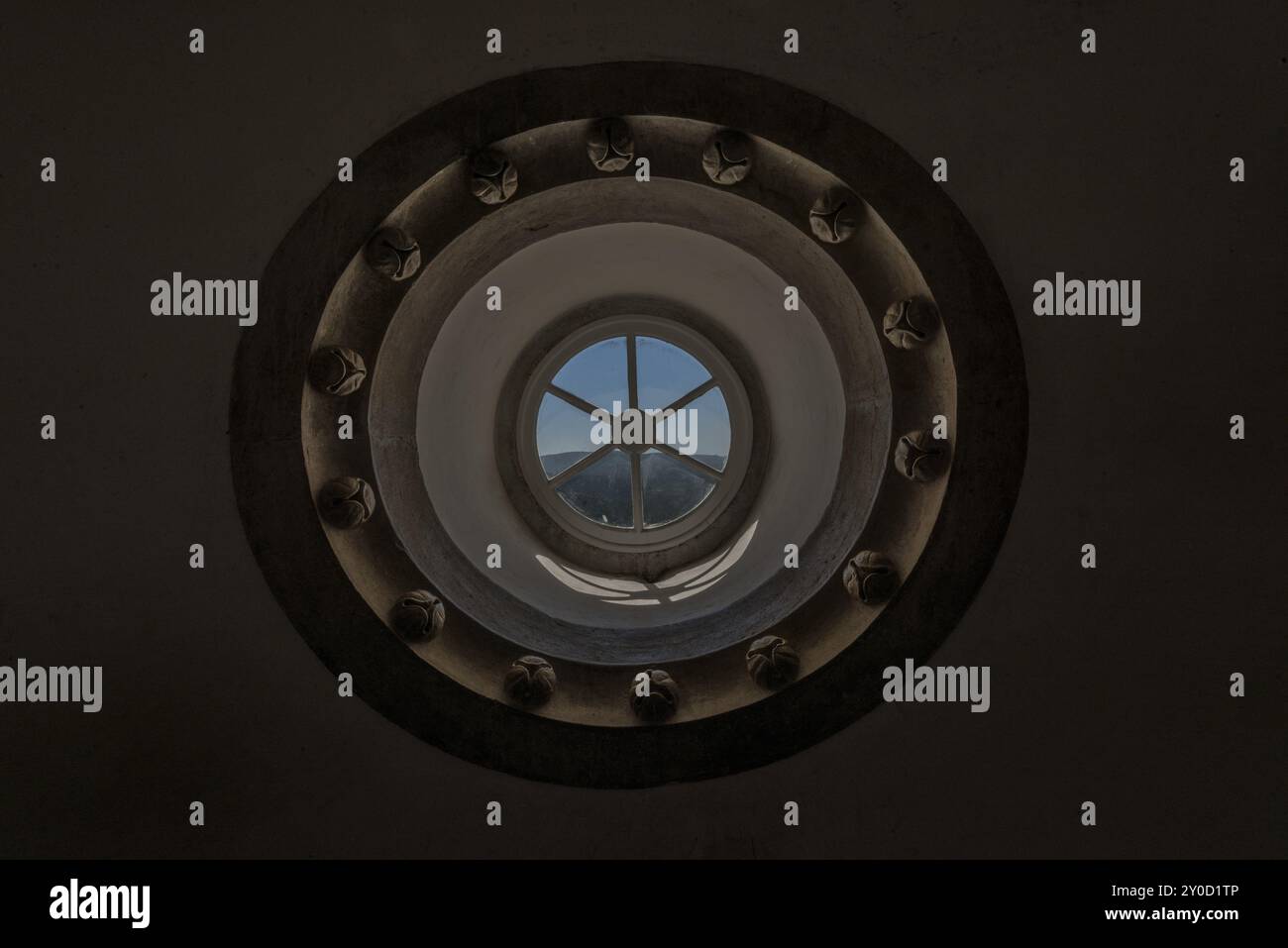 Round window sunny landscape outside, black interior Stock Photo - Alamy