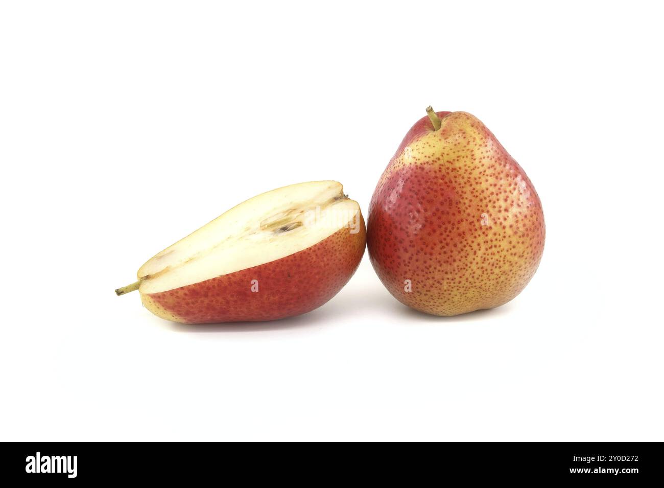 Fresh whole and half cut pear isolated on white background Stock Photo ...