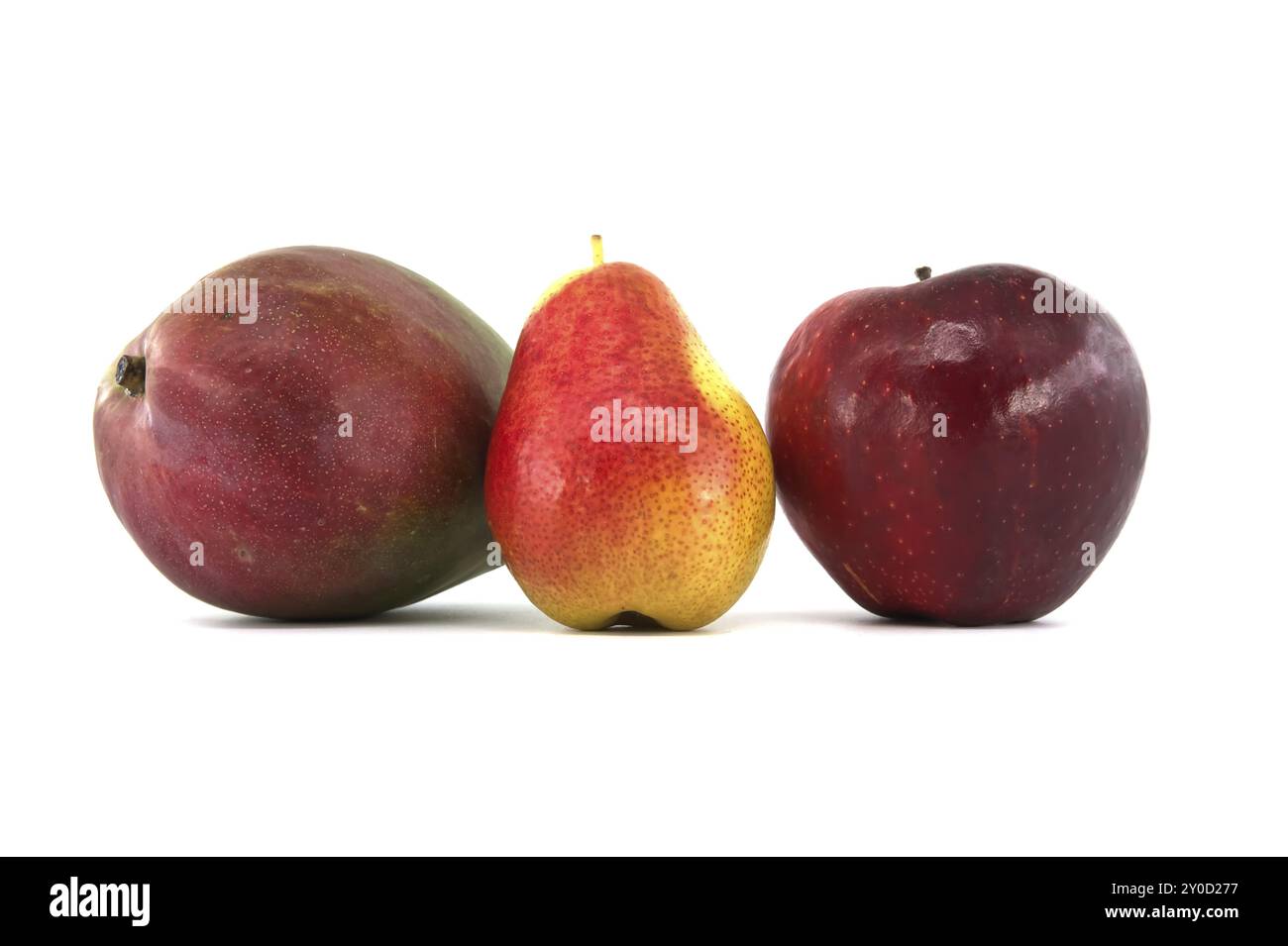 Fresh whole multicolored ripe mango, pears and red apple fruits ...