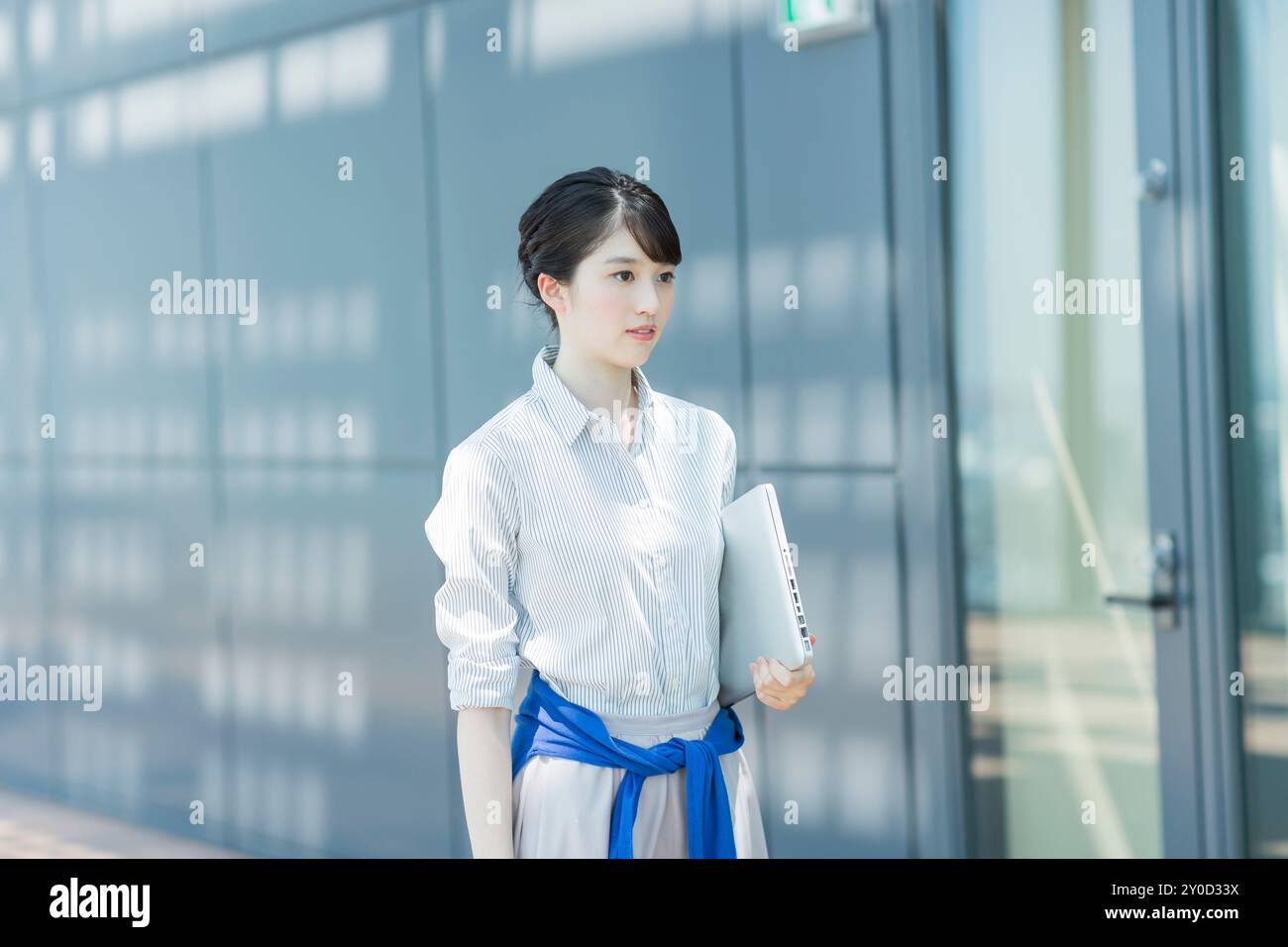 Carring laptop hi-res stock photography and images - Alamy