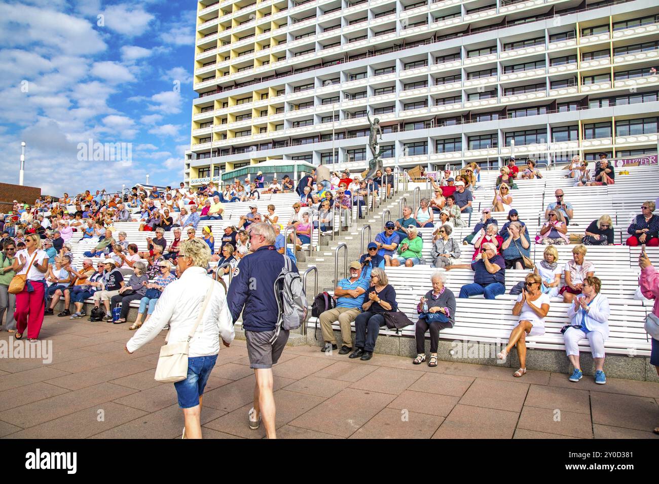 Tourists in front of Metropol tower block, Westerland, Sylt Stock Photo ...