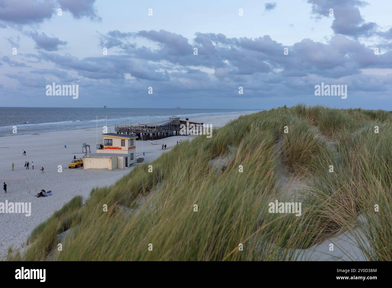 Sandy beach beach seen from the dunes, lifeguard station and 't ...