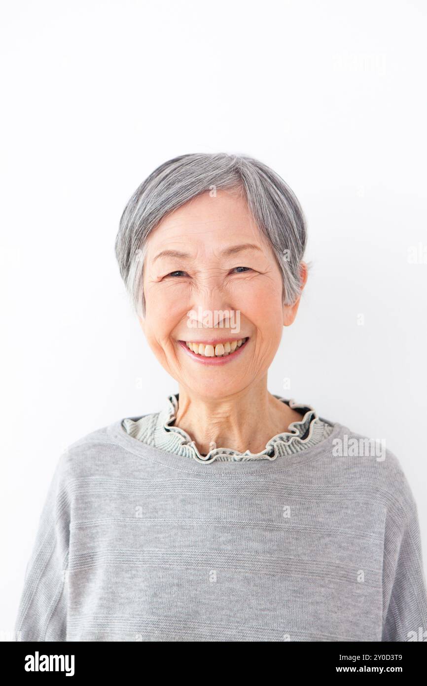 A senior woman's smiling face Stock Photo - Alamy