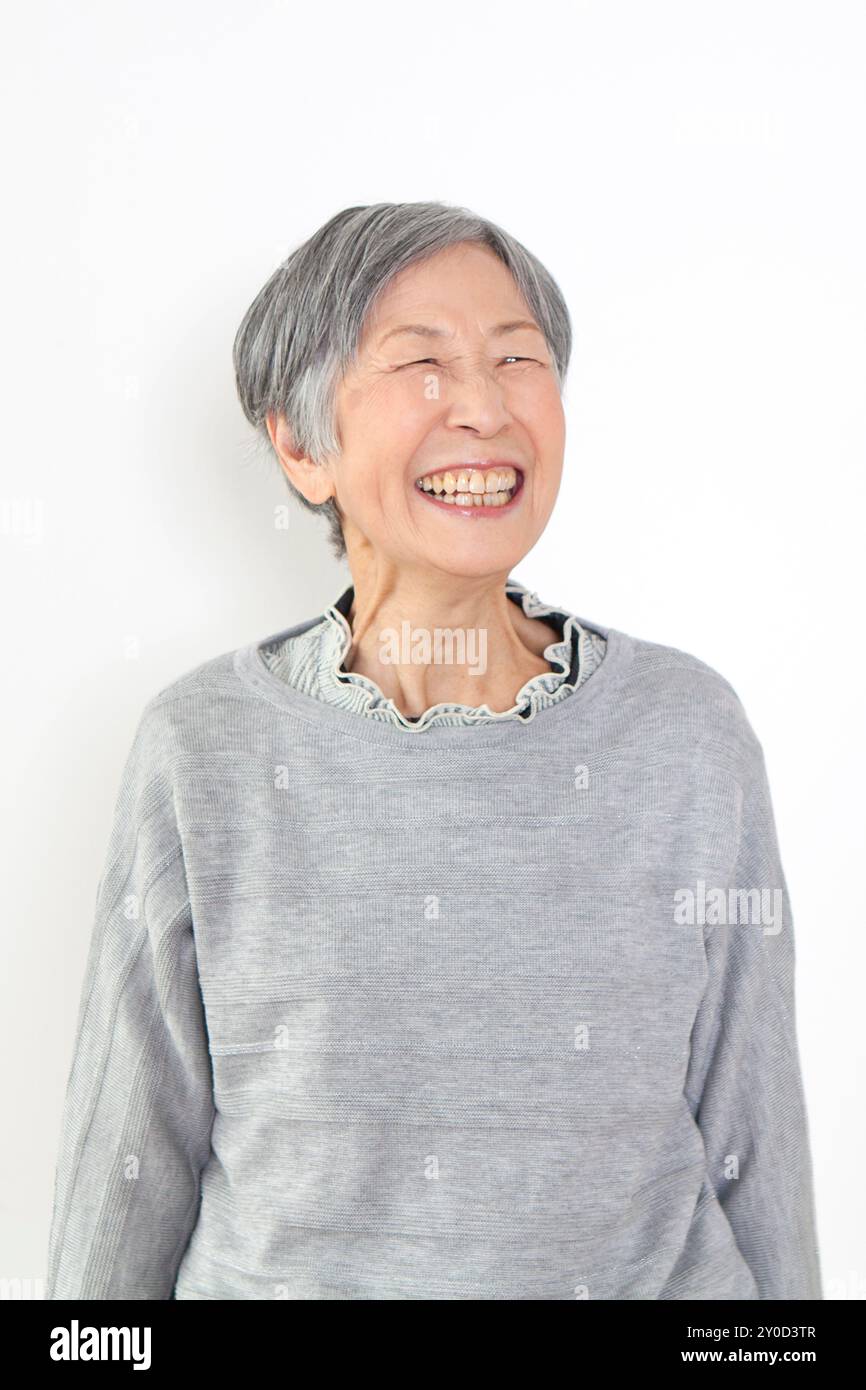 A senior woman's smiling face Stock Photo - Alamy