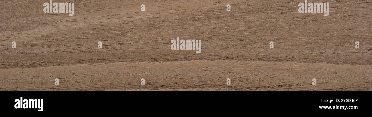 Streamlined grains of warm walnut wash across this veneer, displaying a ...