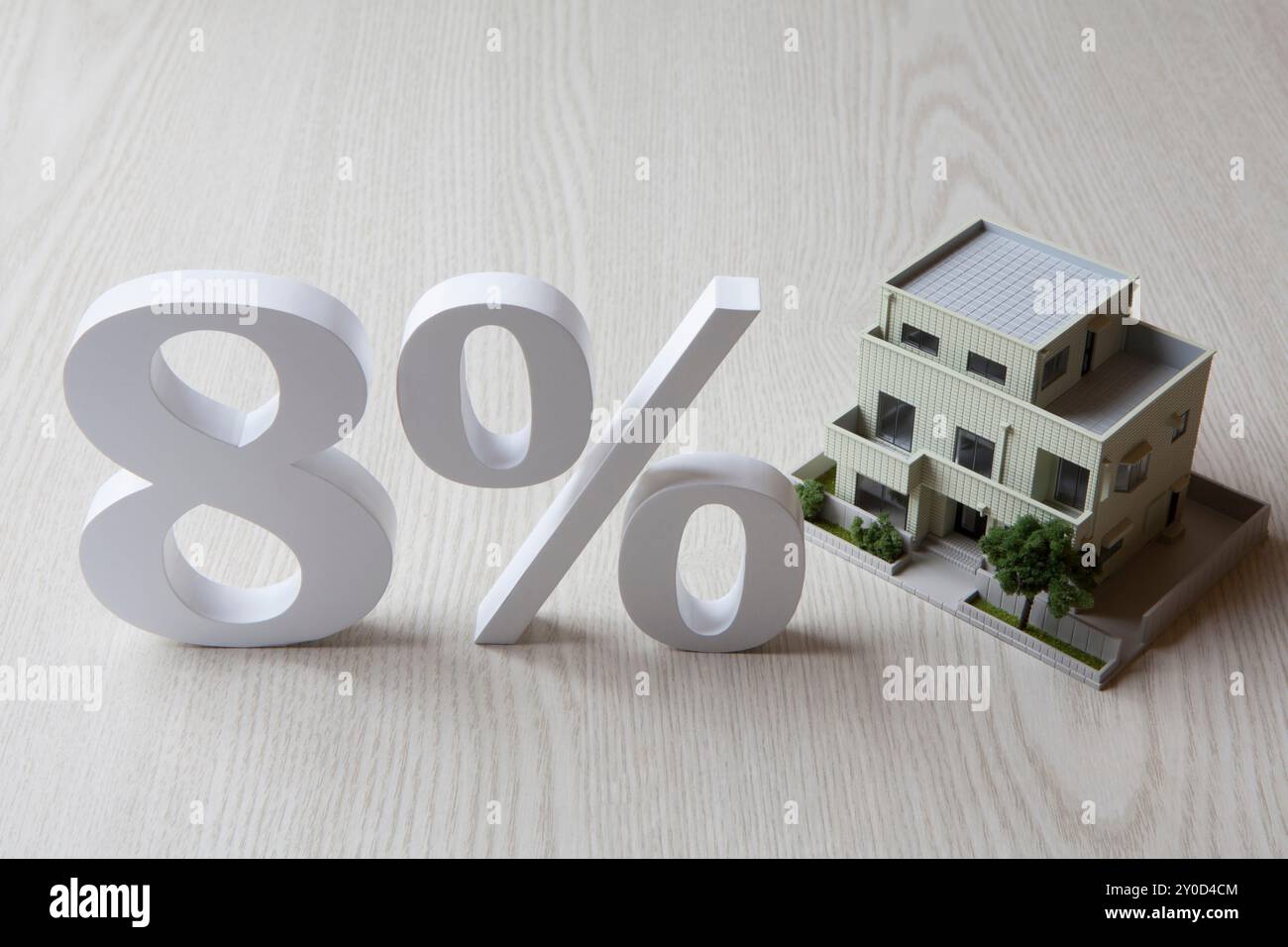 Consumption tax rate of 8% and models of house Stock Photo - Alamy