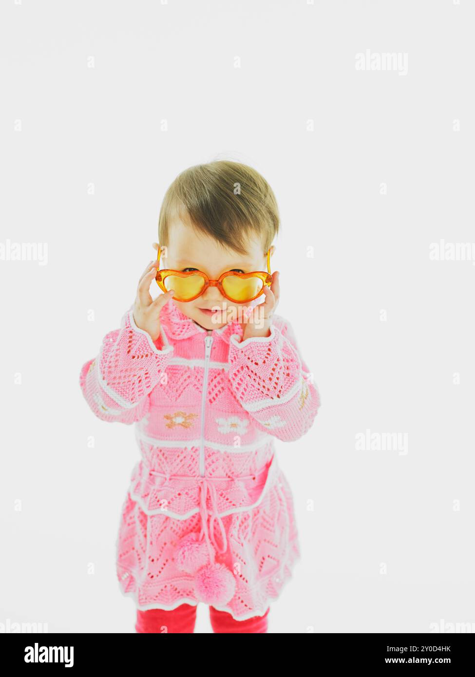 Baby girl wearing spectacles Stock Photo - Alamy