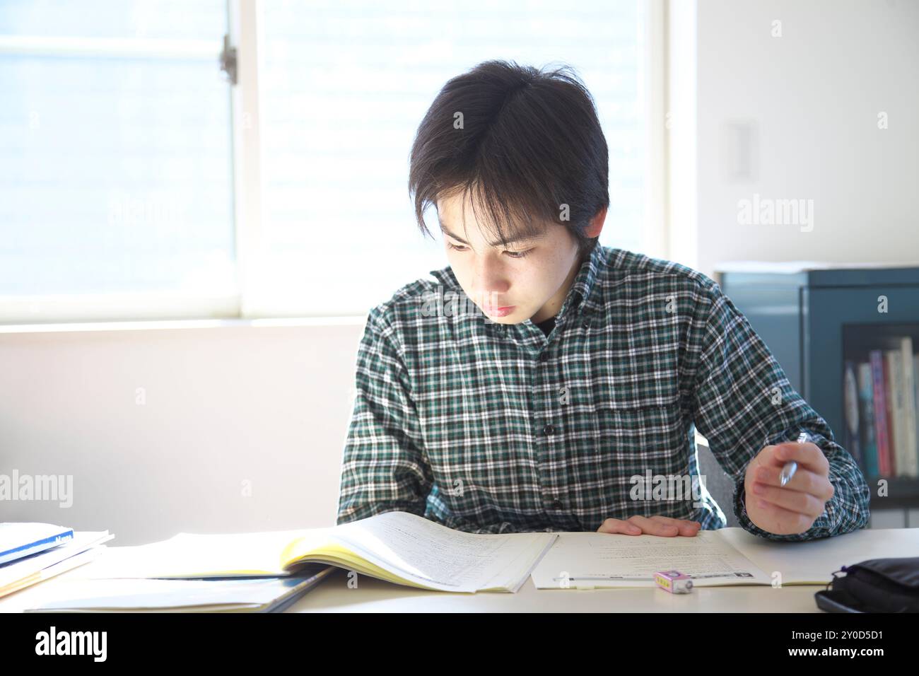 A boy studying Stock Photo - Alamy