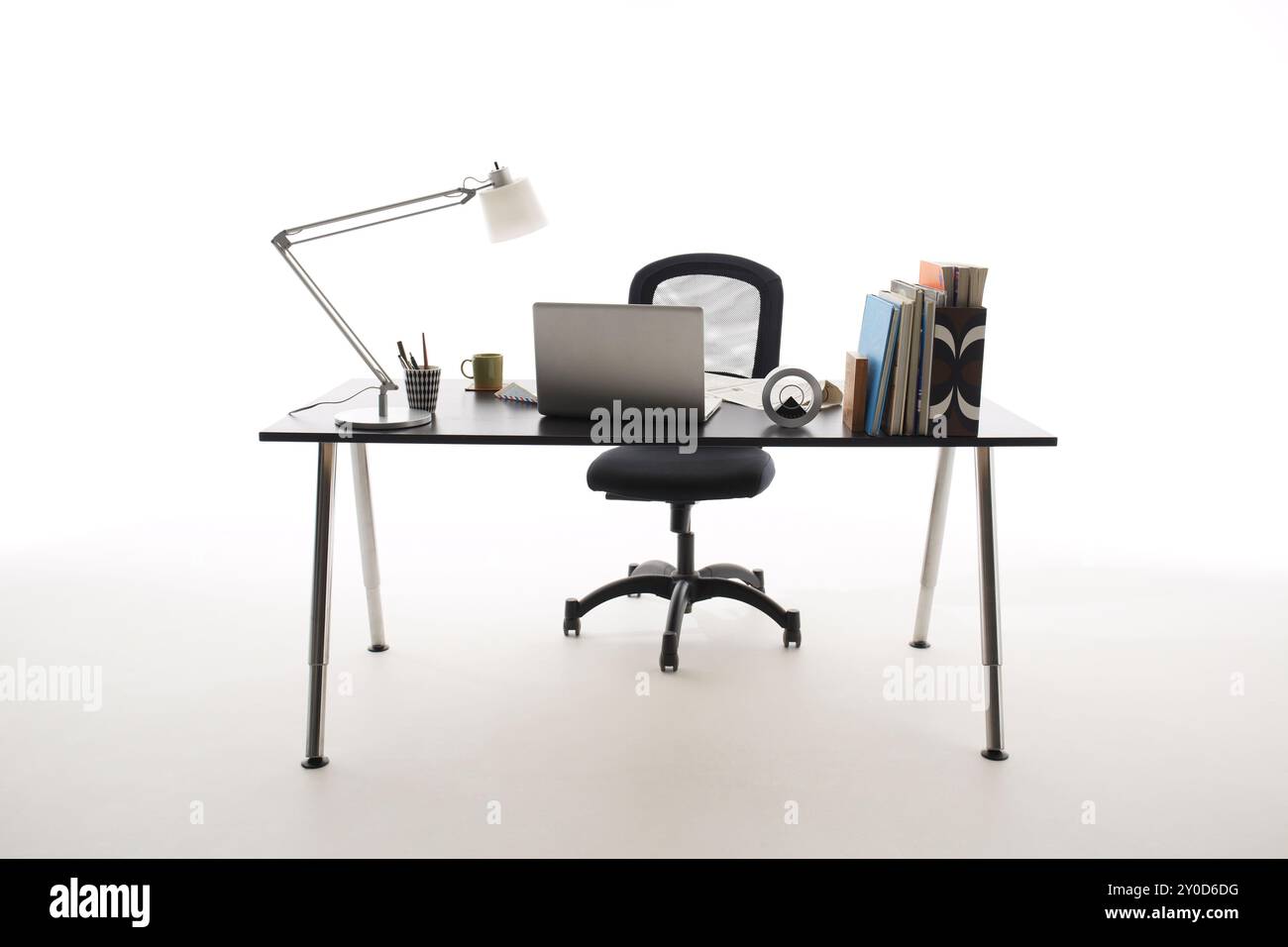 Calendar and materials on a black desk Stock Photo - Alamy