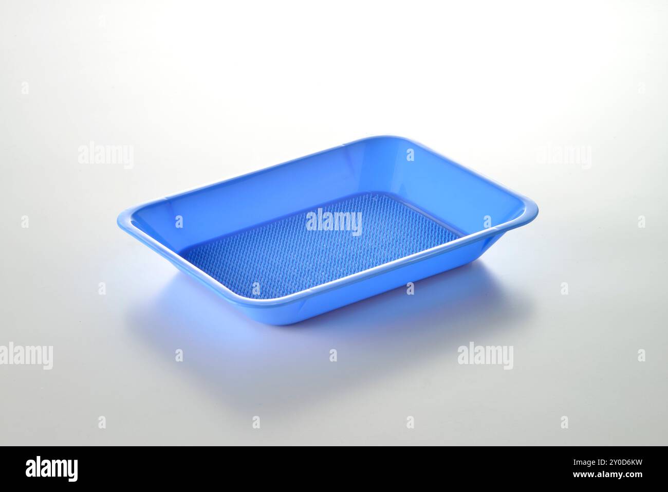 Change tray with a white background Stock Photo - Alamy