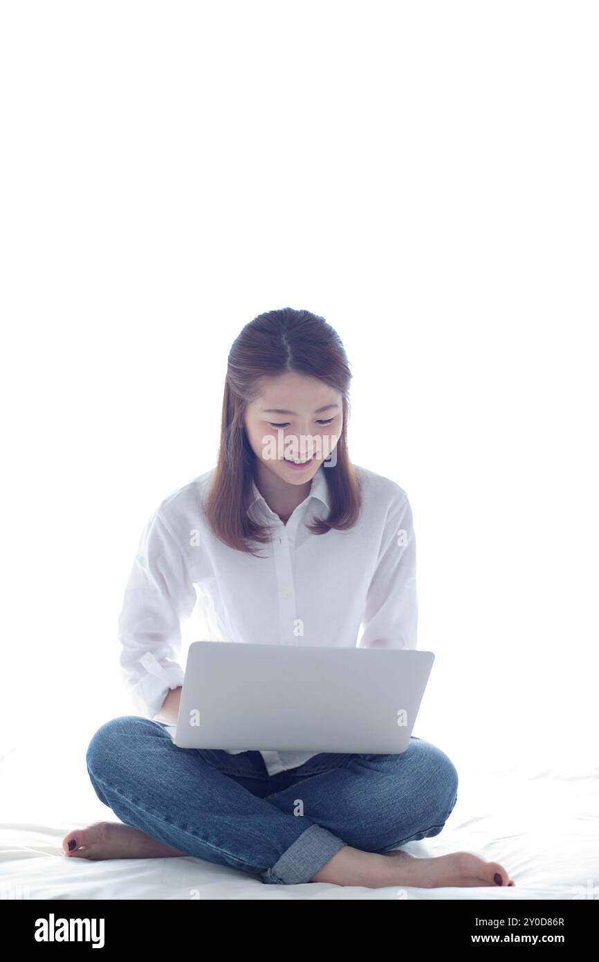 a female operating a computer Stock Photo - Alamy