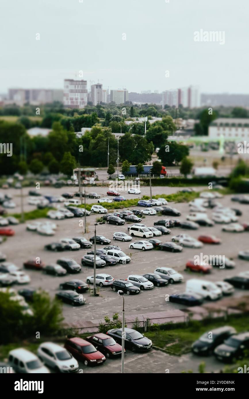 Huge parking lot with many cars in a sleeping area of big city ...
