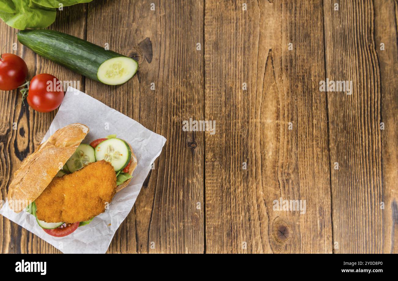 Chicken Schnitzel on a bun (selective focus, detailed close-up shot ...
