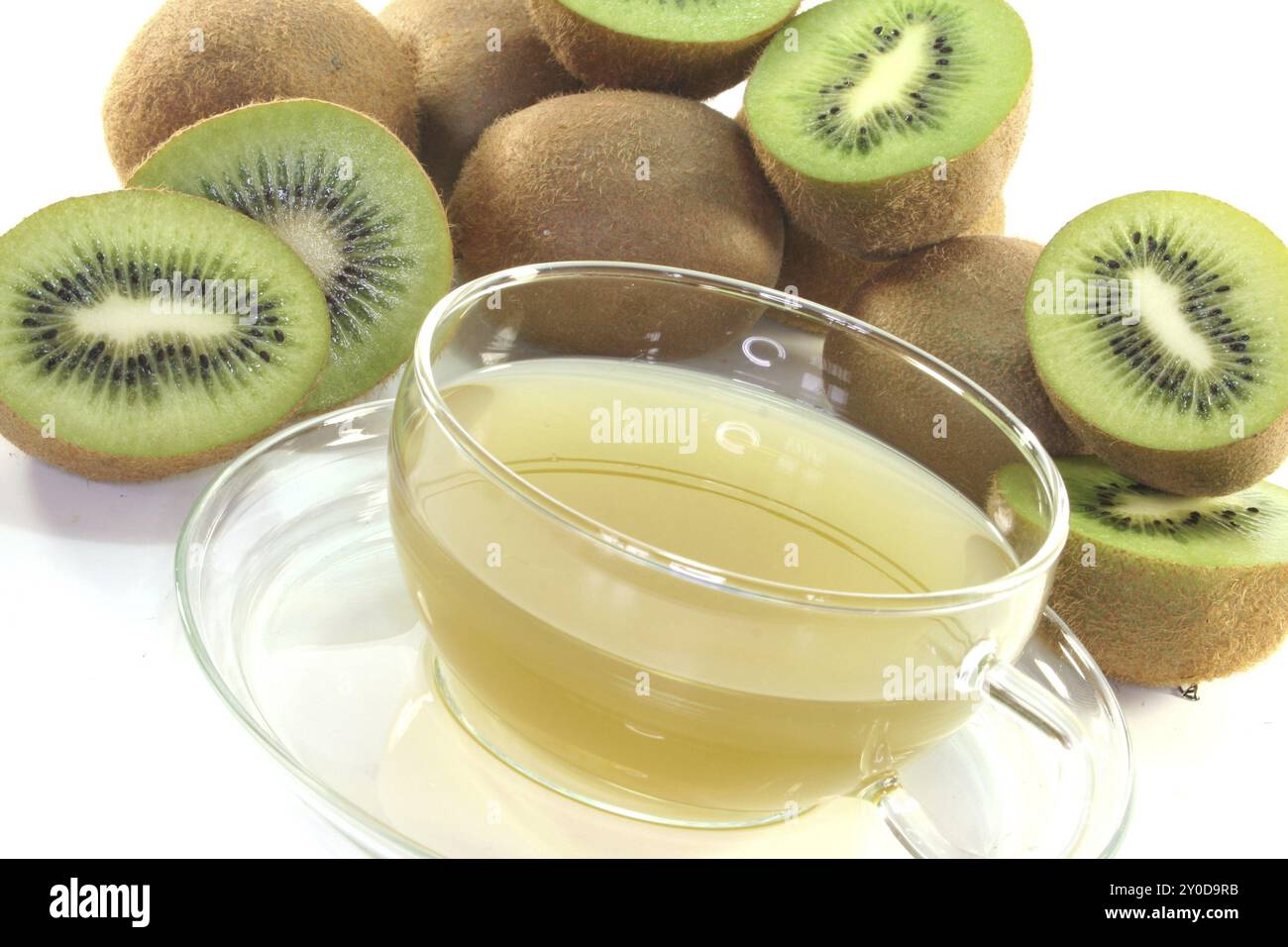 Kiwi tea with fresh kiwis on a white background Stock Photo - Alamy