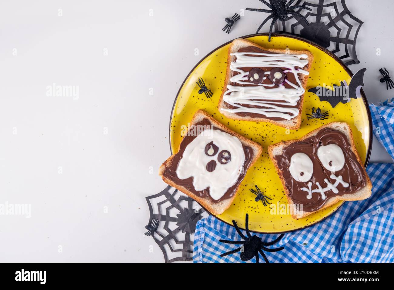 Funny Halloween characters toast sandwiches with nuts chocolate butter ...