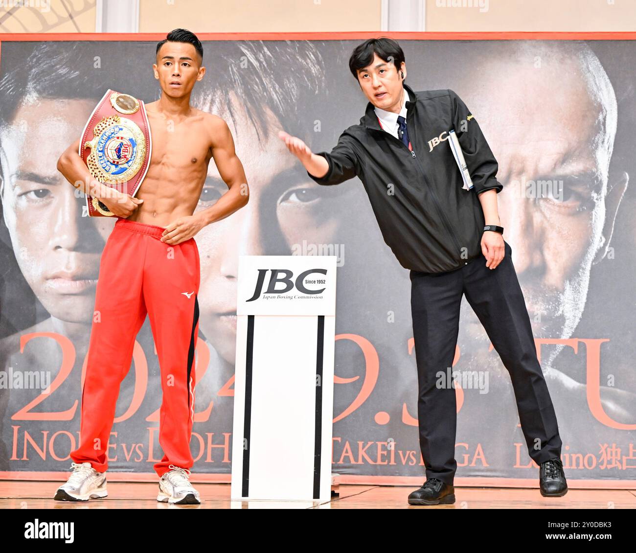 WBO Bantamweight champion Yoshiki Takei (L) and boxing inspector ...