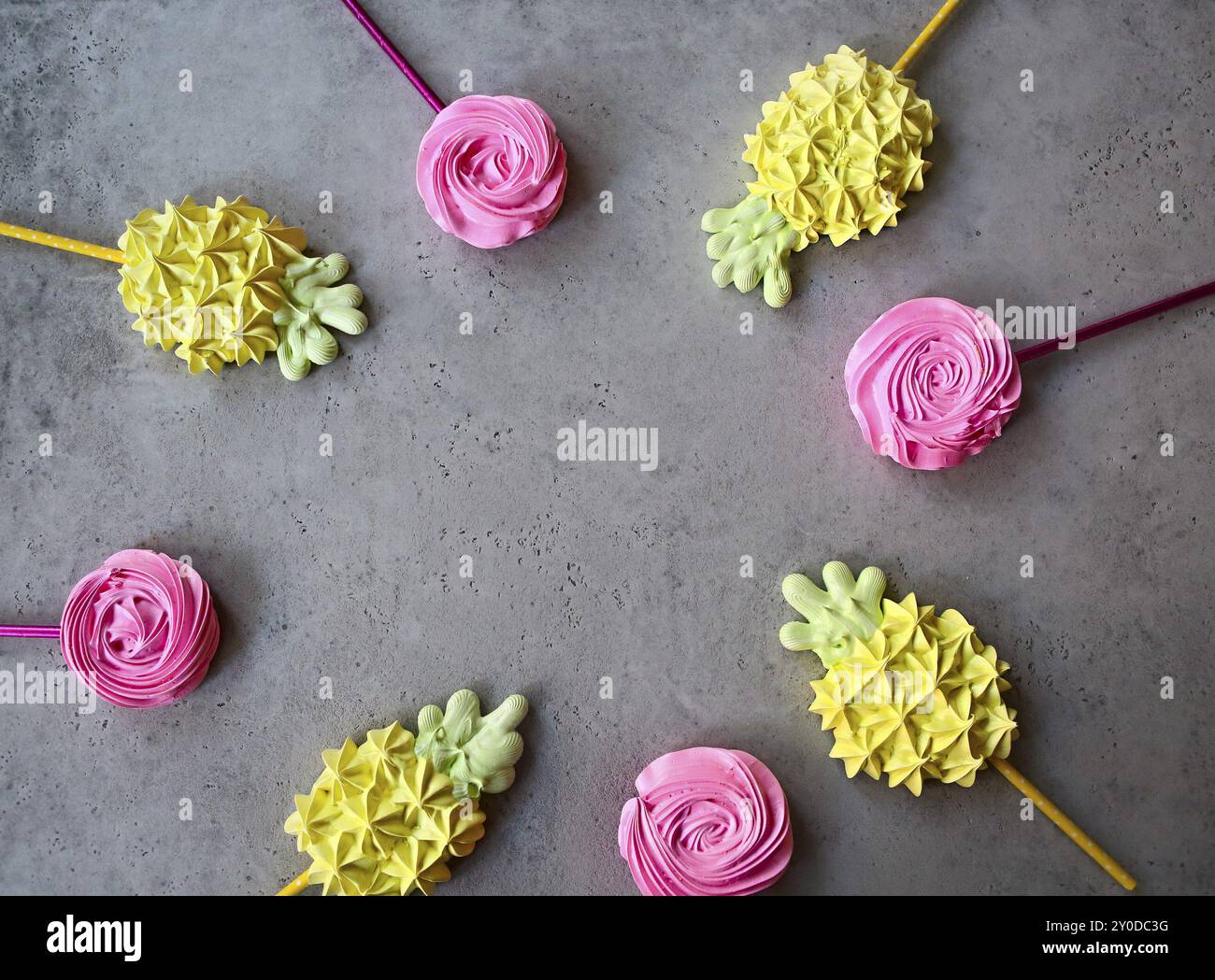 Cool sweet meringues in the pineapple and roses form. Tropical sweets ...