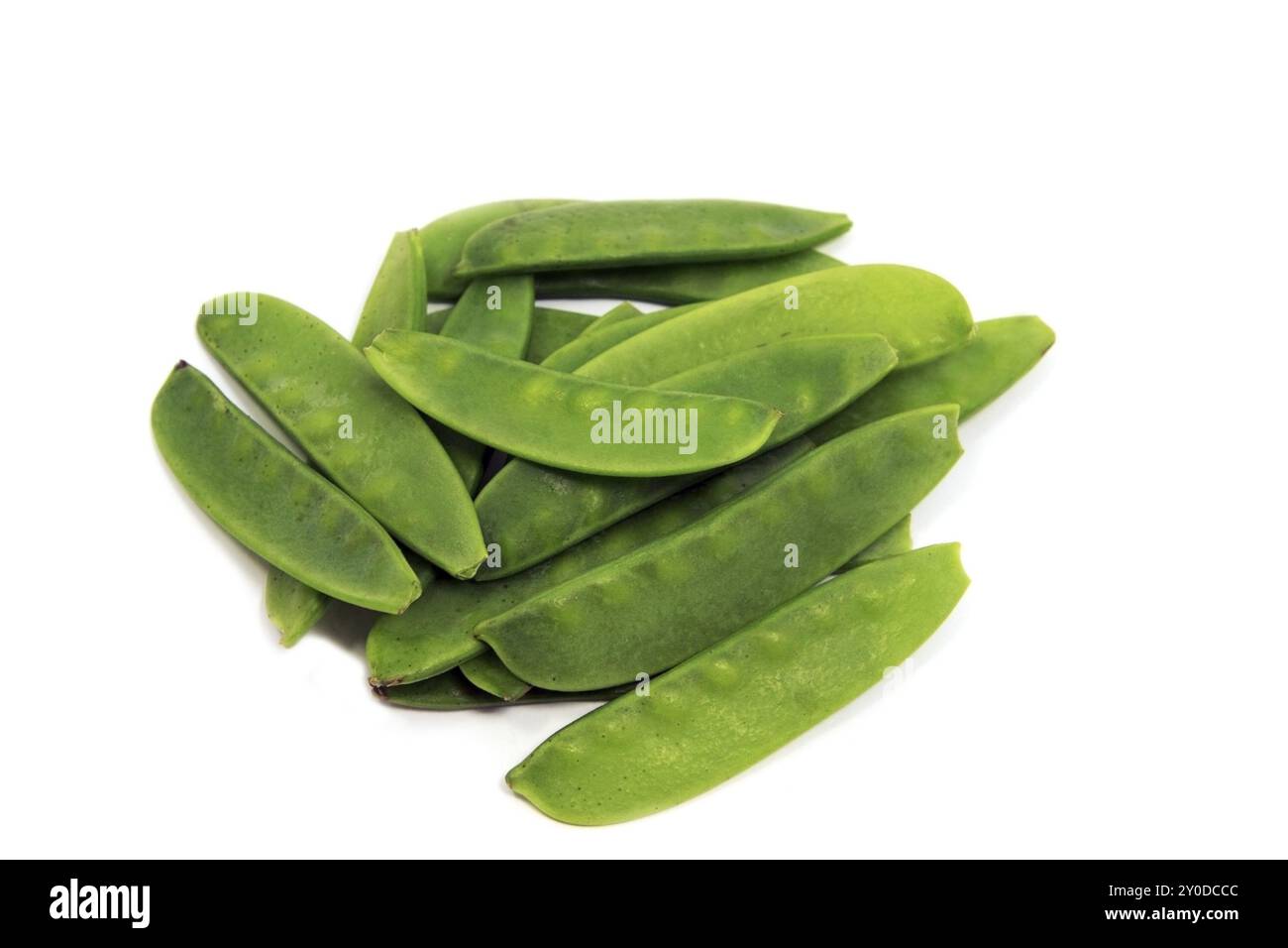 Many green pea pods on white background Stock Photo - Alamy