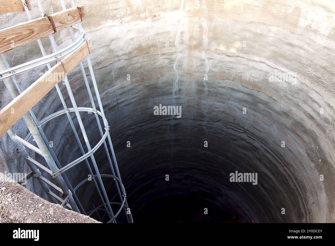 Concreted hole under the ground close up Stock Photo - Alamy
