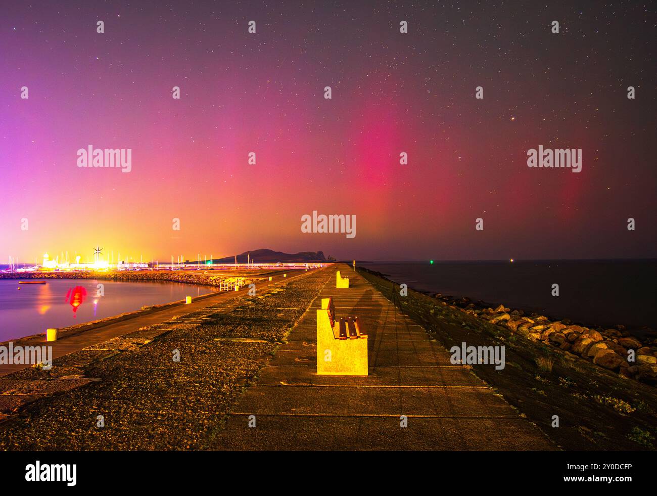 A faint display of aurora borealis at Howth East Pier Stock Photo - Alamy