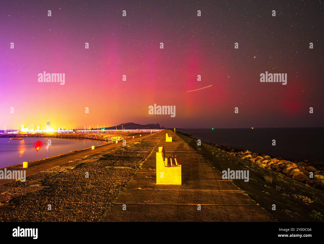 A faint display of aurora borealis at Howth East Pier Stock Photo - Alamy