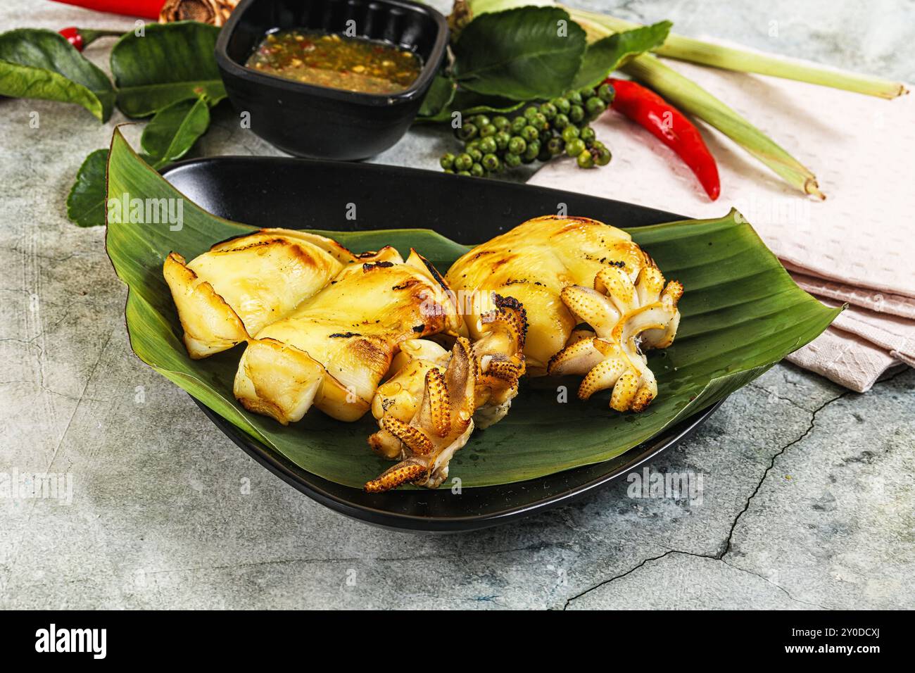 Delicous Grilled cuttlefish with sauce asian style Stock Photo - Alamy